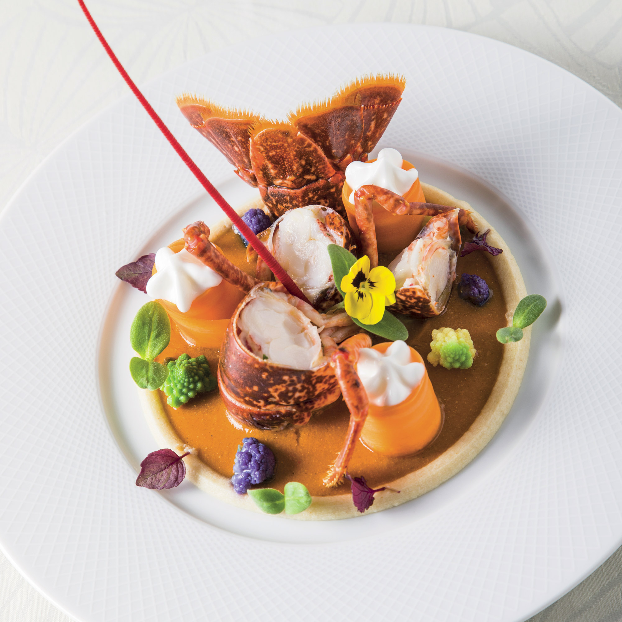 Recette : Queue de homard bleu rôtie en coque - Arts & Gastronomie